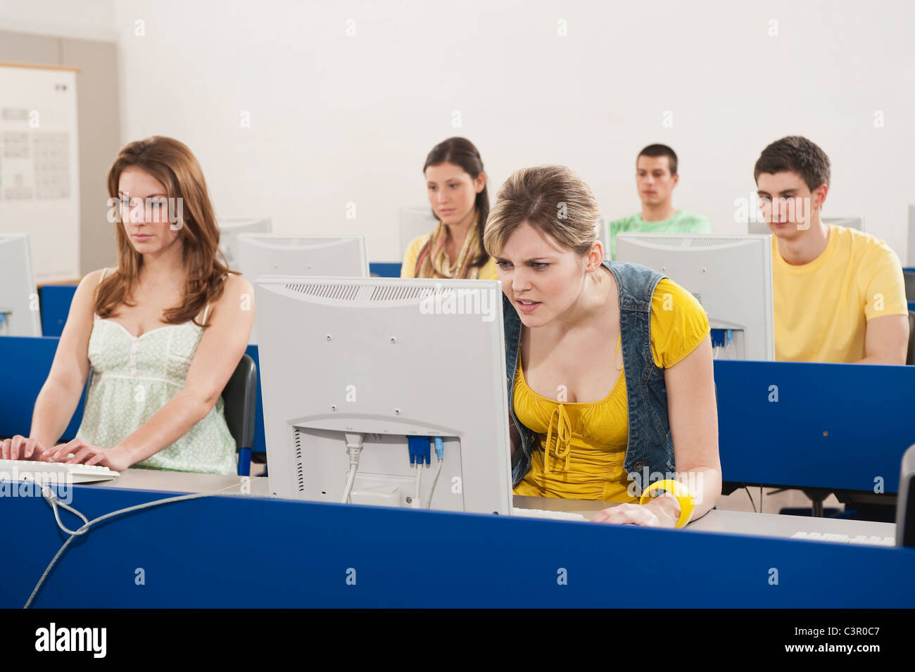 Germany, Emmering, Students using computer in computer lab Stock Photo ...