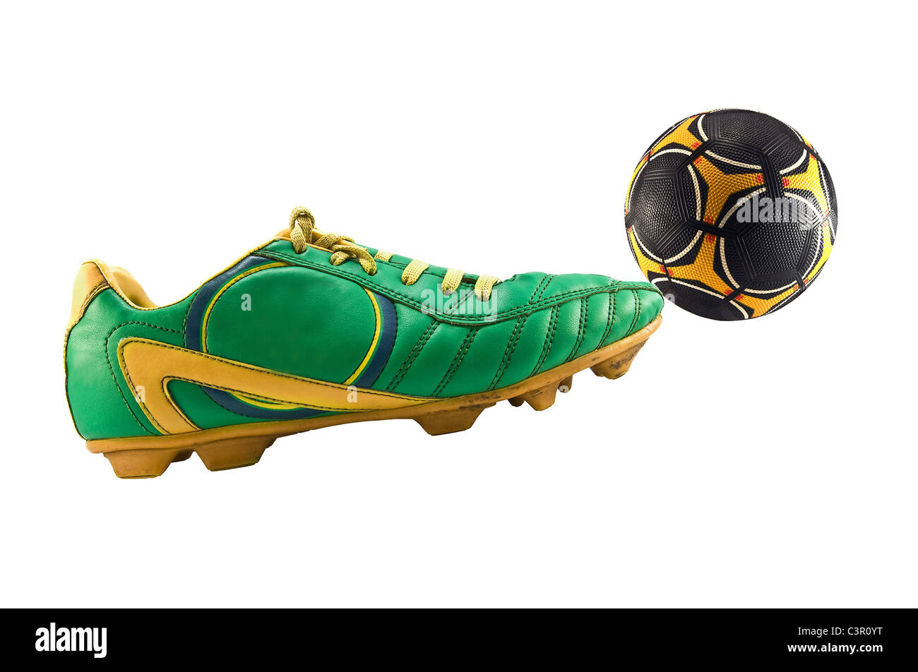 cleats and ball isolated on a white background Stock Photo - Alamy