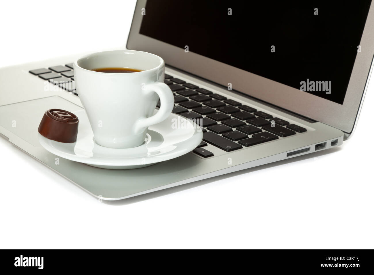 A cup of coffee and laptop isolated on white Stock Photo - Alamy