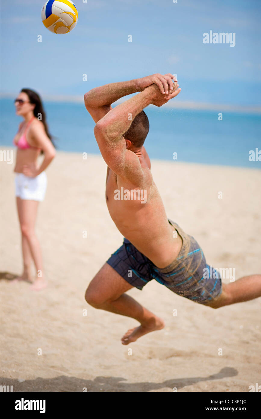 Croatia, Zadar, Friends playing volley ball at beach Stock Photo - Alamy