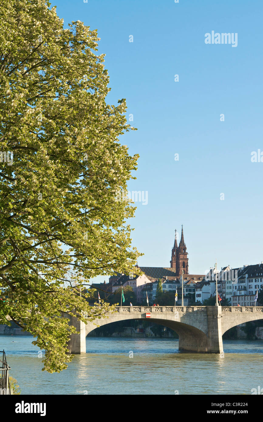 Switzerland, Basel, bridge over Rhine river with Basel Cathedral in ...