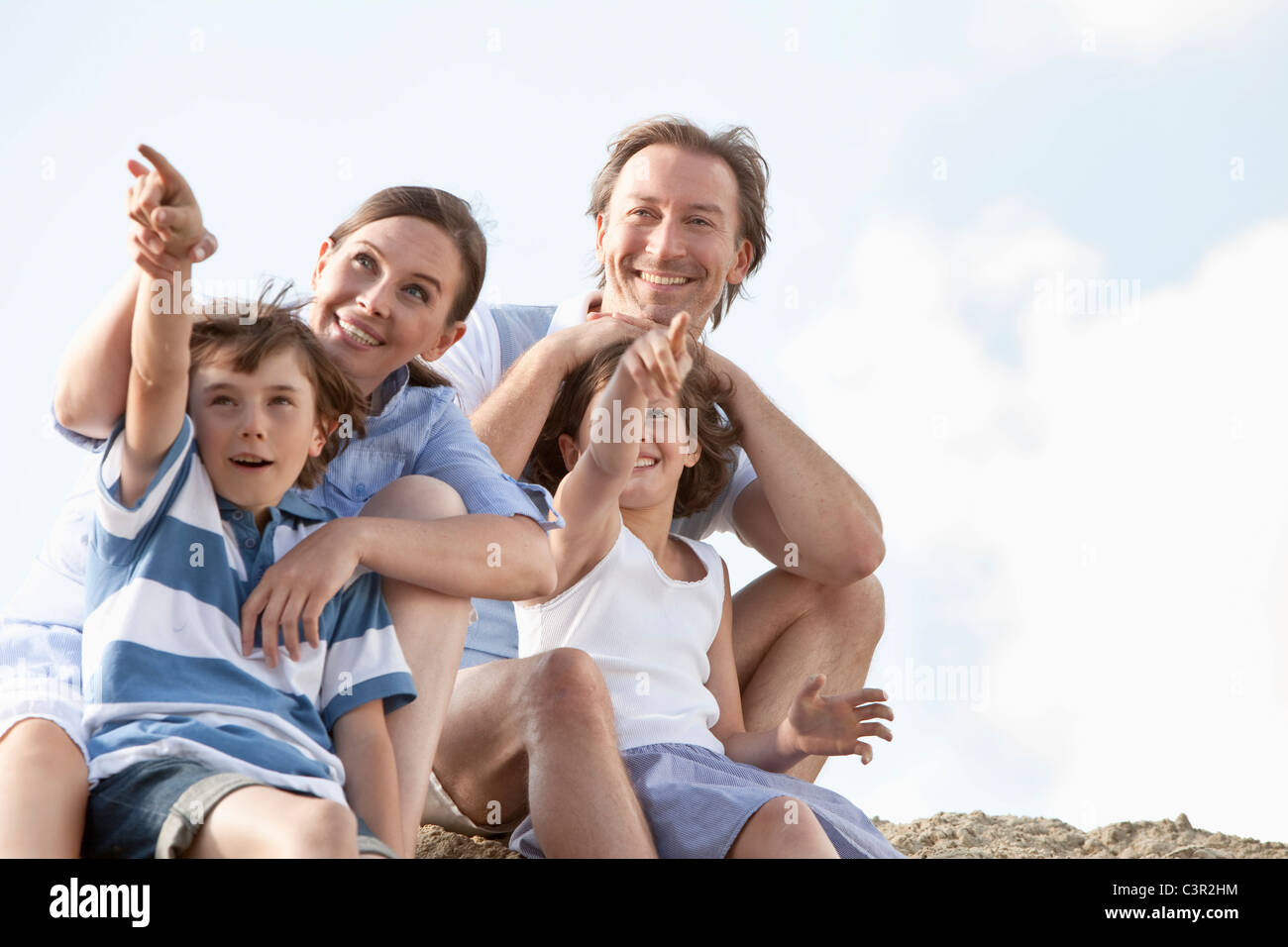 Germany, Family enjoying together, smiling Stock Photo - Alamy