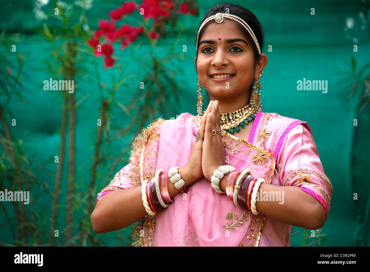 An Indian girl greeting ( Namaste Stock Photo - Alamy