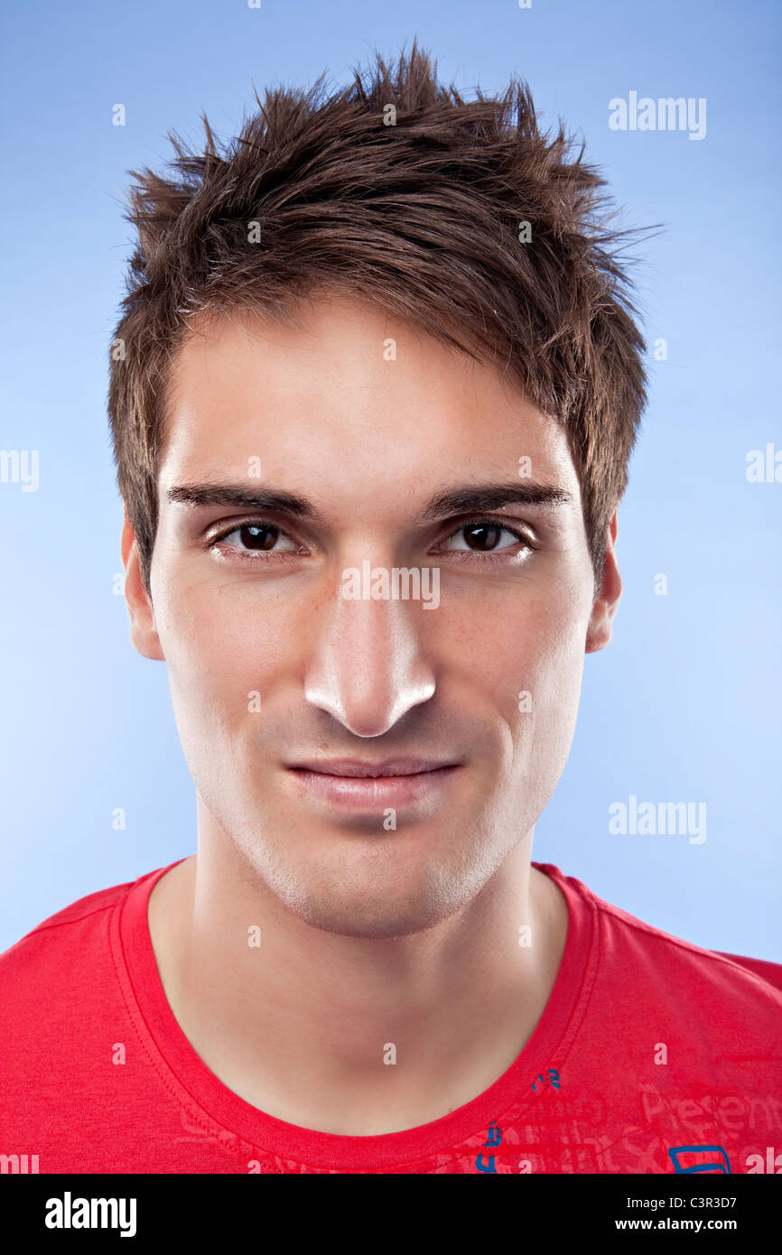 Young man smiling, portrait, close up Stock Photo - Alamy