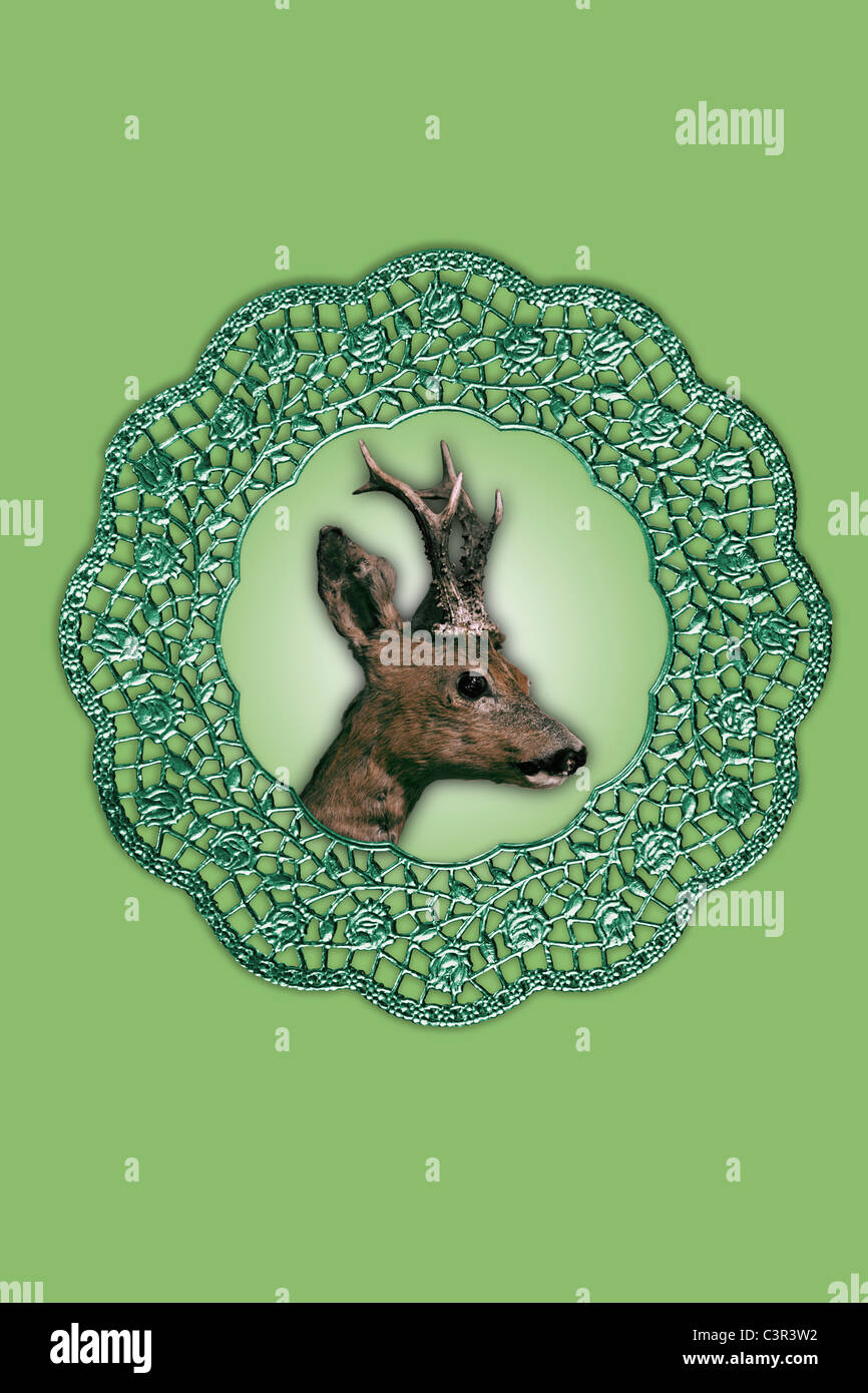 Deer collage artwork in picture frame against green background Stock ...