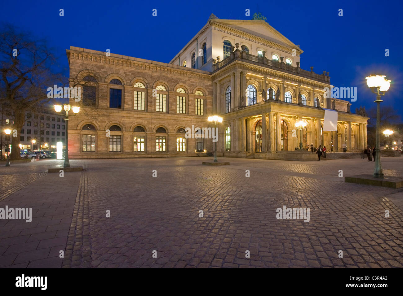 Germany, Hannover, View of illuminated opera house at night Stock Photo ...