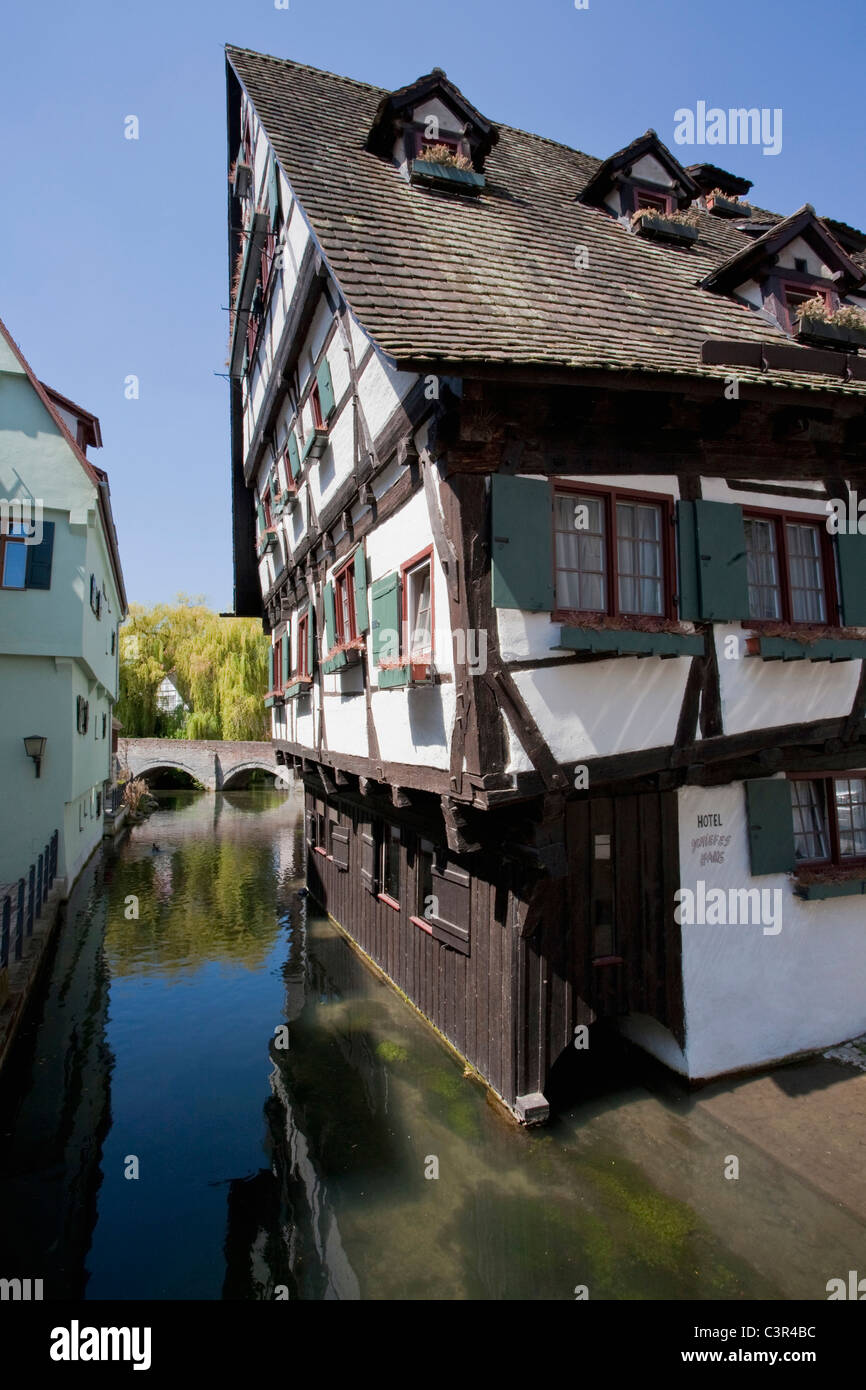 Germany, Ulm, Fisher District, Crooked schiefes haus hotel next to lake ...