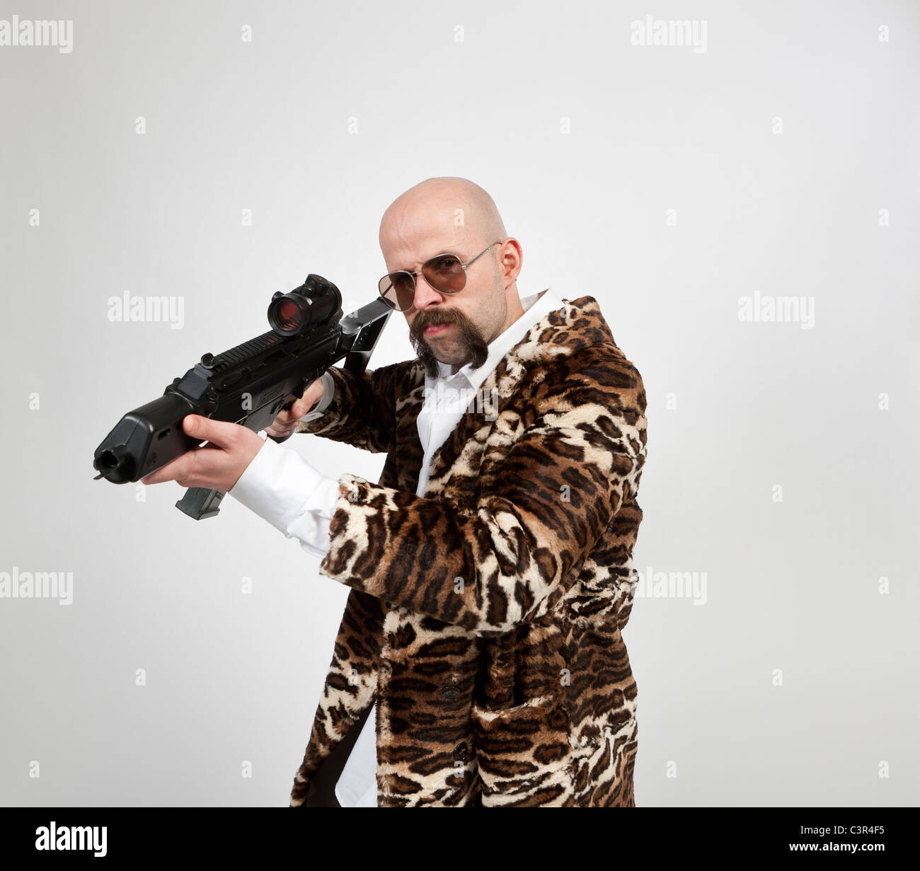 Man with machine pistol Stock Photo - Alamy