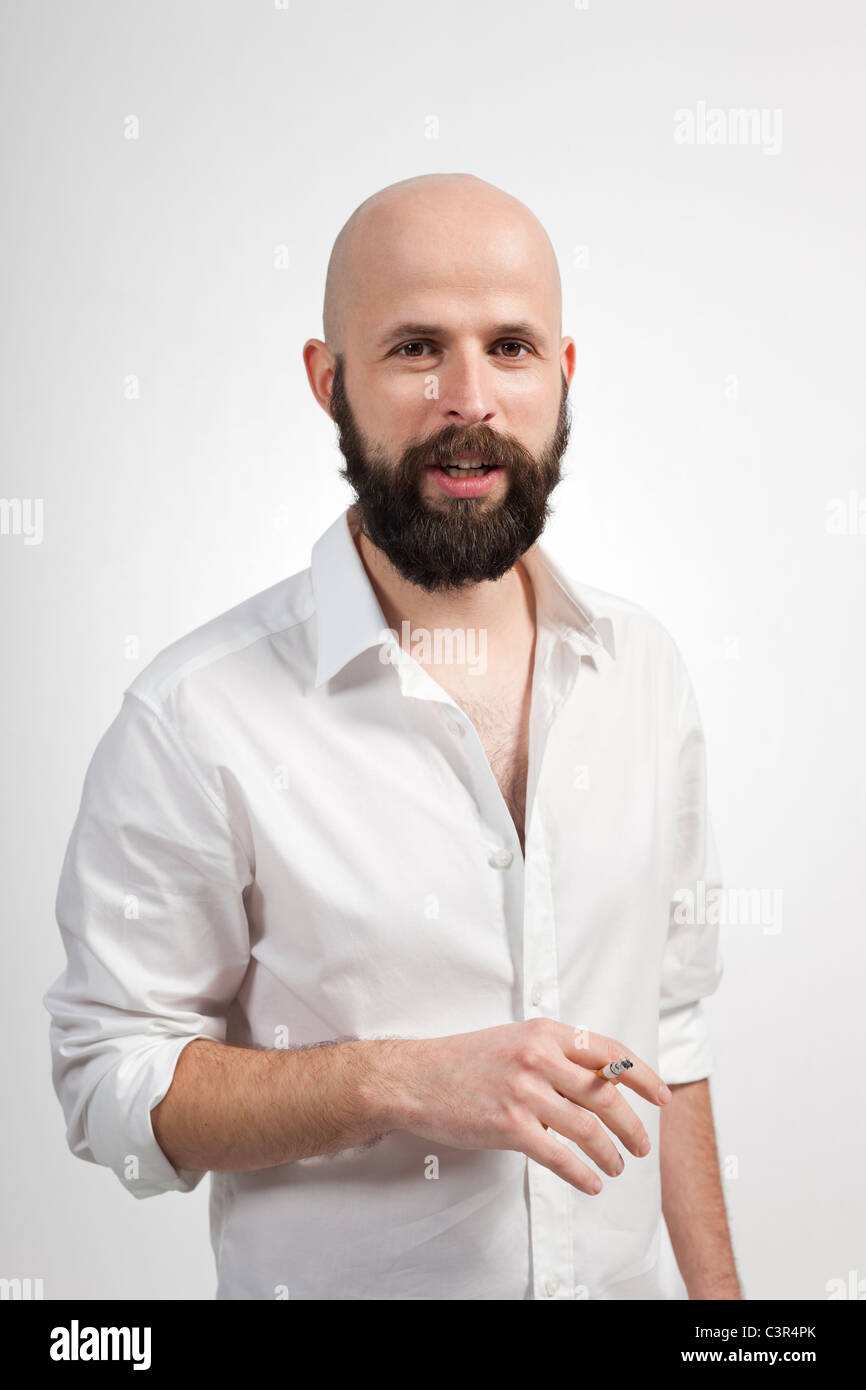 Bald man smoking hi-res stock photography and images - Alamy