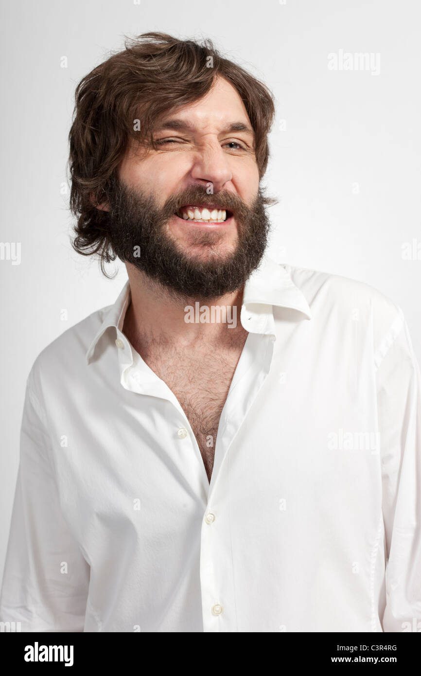 Man clenching teeth, close up Stock Photo - Alamy