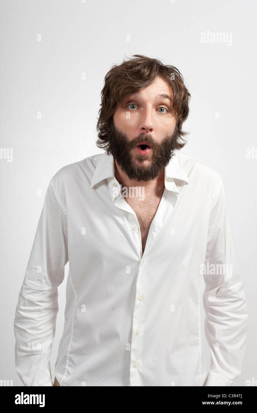 Man pulling funny faces, portrait Stock Photo - Alamy