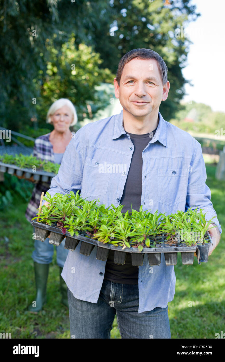 Germany, Saxony, Man and woman at the farm, smiling, portrait Stock ...
