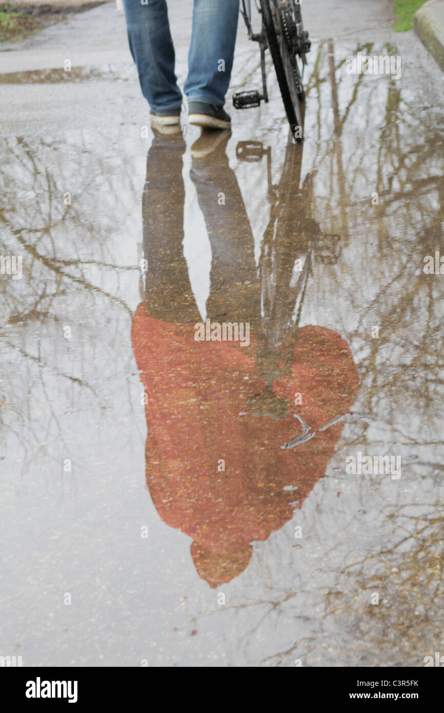 Man puddle water hi-res stock photography and images - Alamy