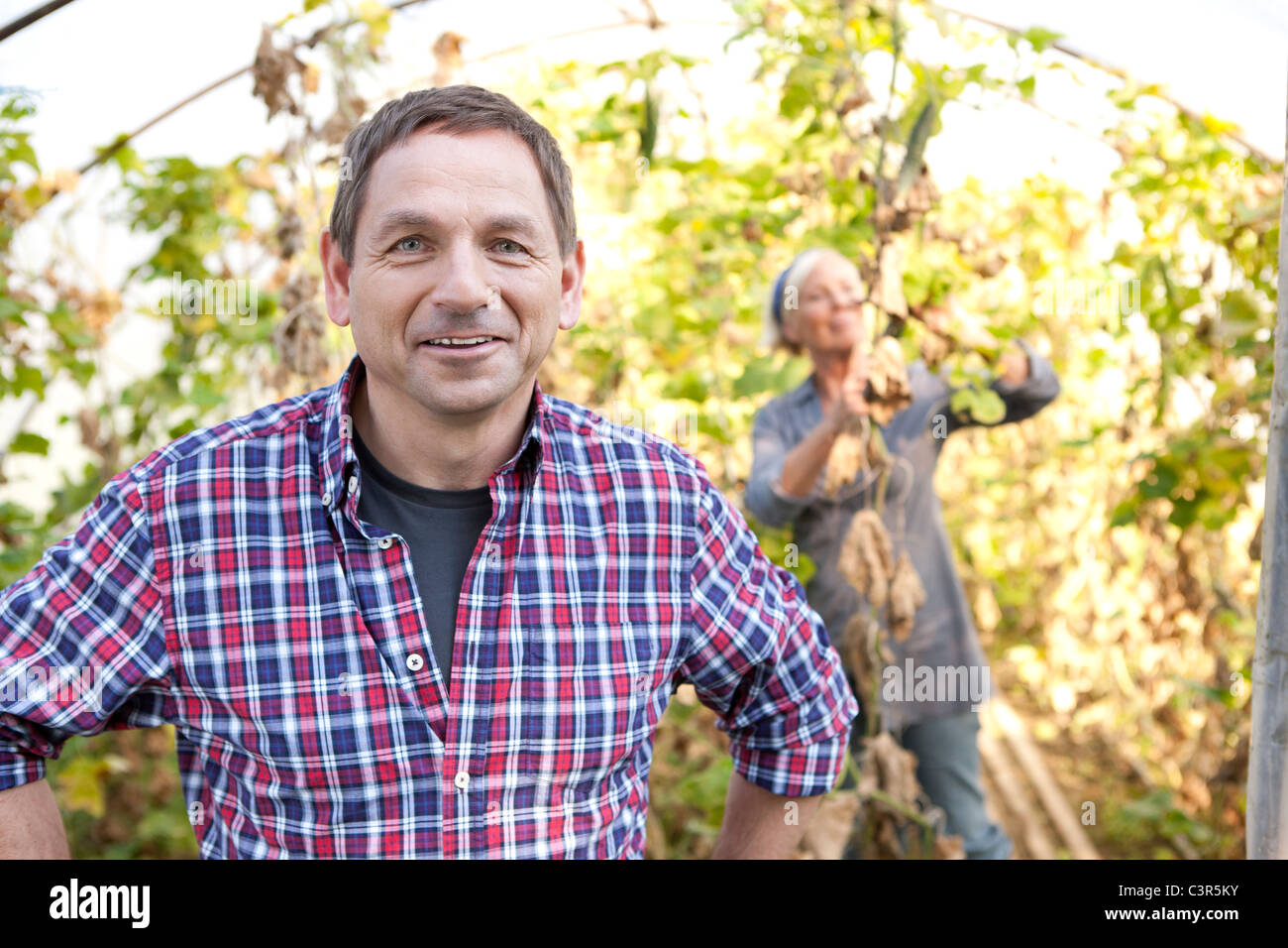 Germany, Saxony, Man and woman in the farm Stock Photo - Alamy