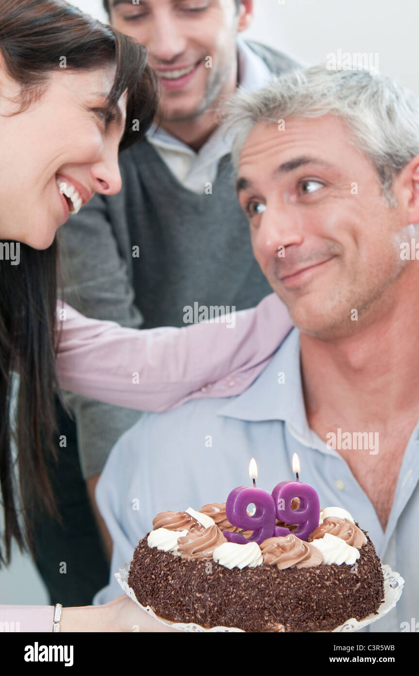 Woman bringing cake to party hi-res stock photography and images - Alamy