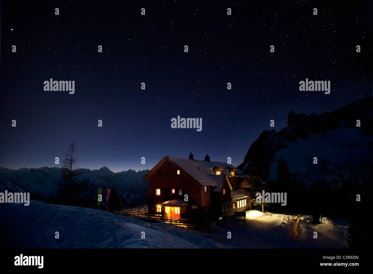 Mountain hut at night Stock Photo - Alamy