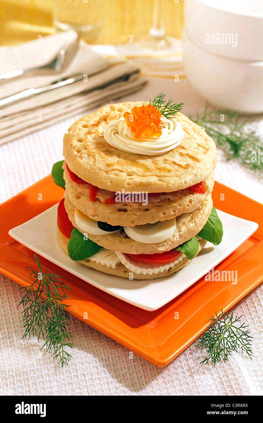 Blinis tower. Recipe available Stock Photo - Alamy
