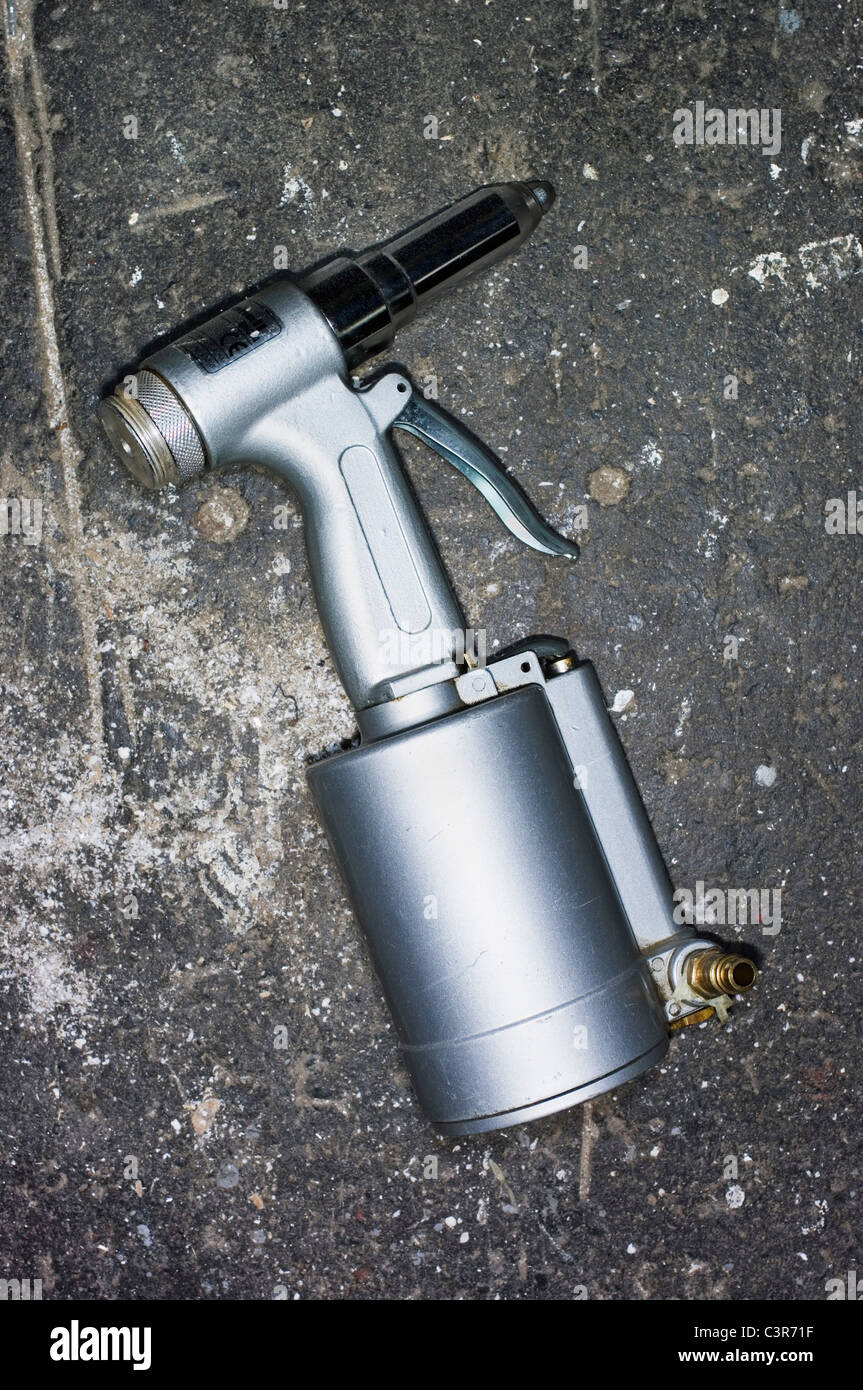 Germany, Hessen, Frankfurt, Spray gun in factory Stock Photo - Alamy