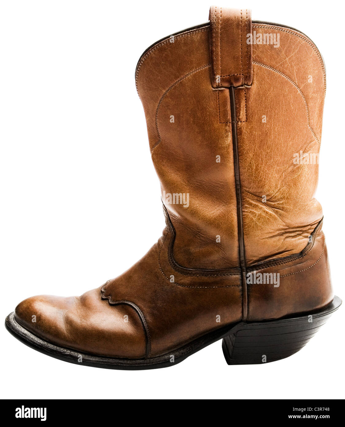 Cowboy boot of brown color isolated over white Stock Photo - Alamy
