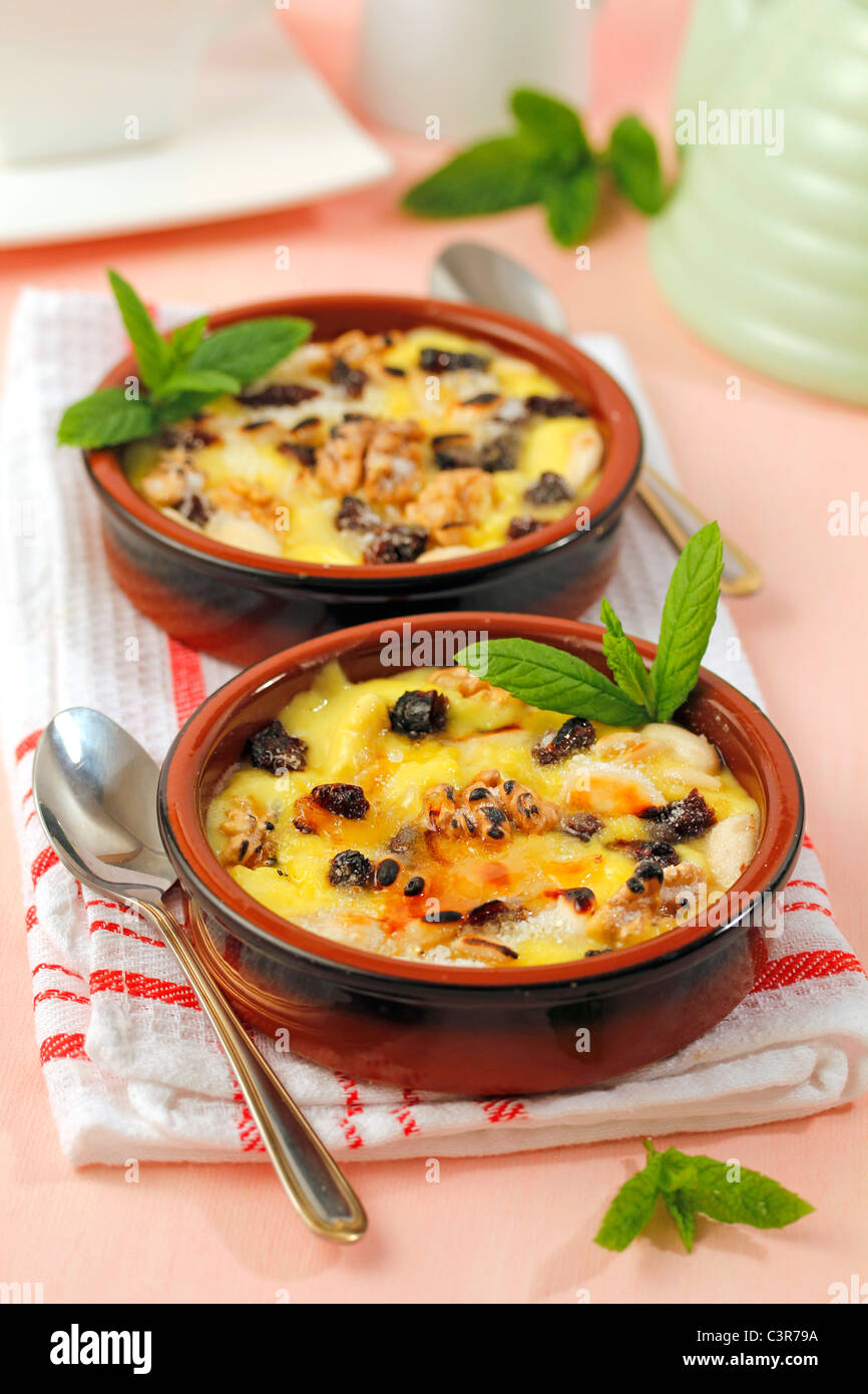 Custard with raisins and nuts. Recipe available Stock Photo - Alamy