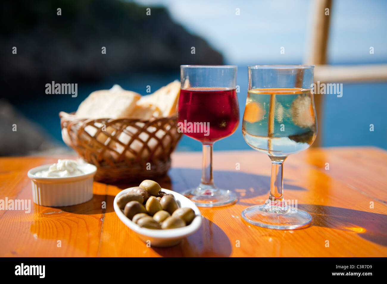 Spain, Mallorca, Food on table with mountain in background Stock Photo ...