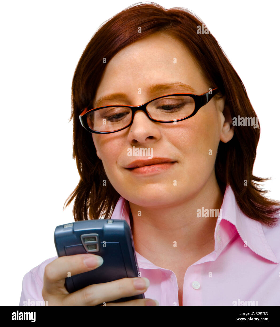 Happy woman text messaging on a mobile phone isolated over white Stock ...