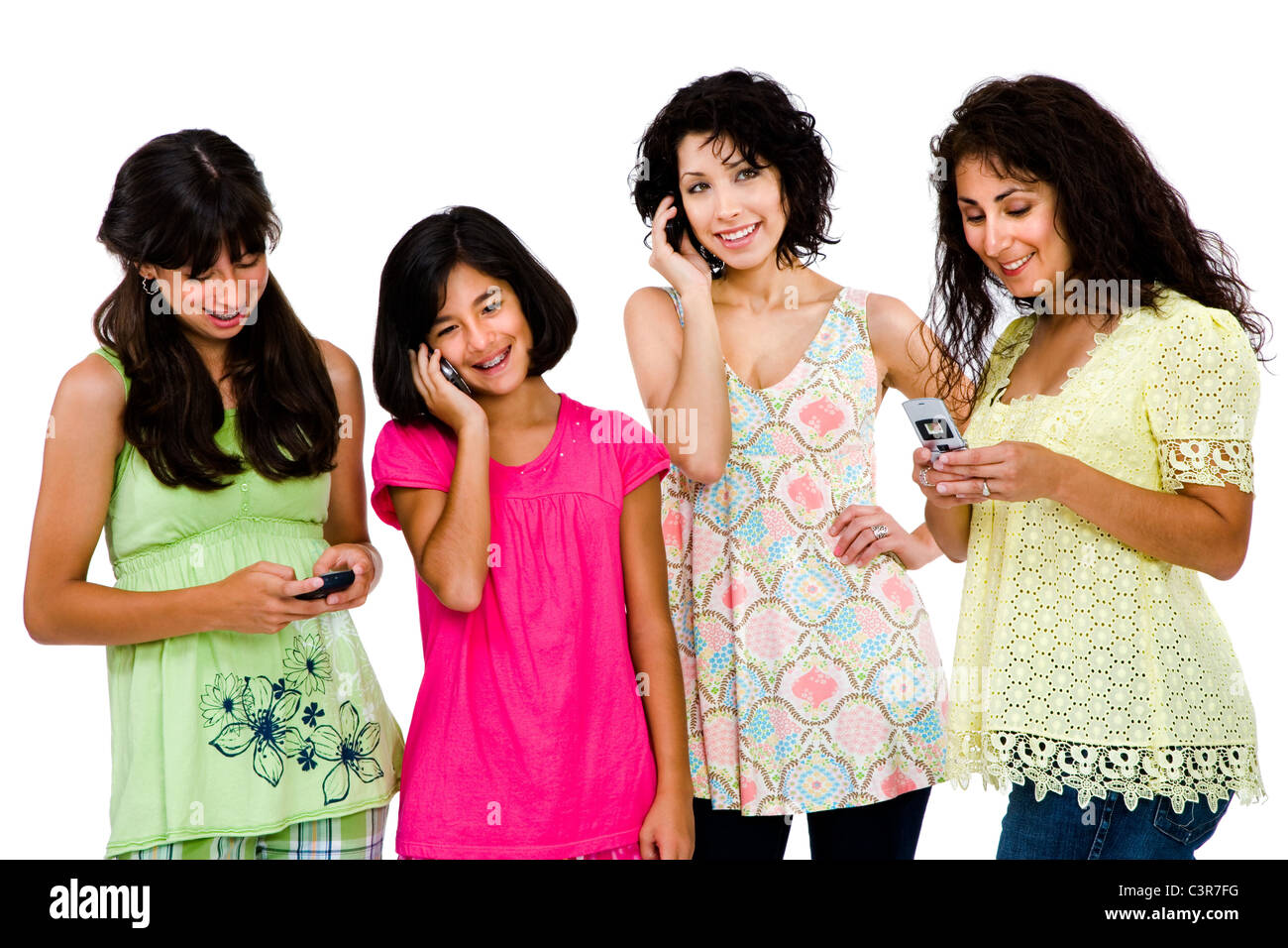 Close-up of a family using mobile phones isolated over white Stock ...