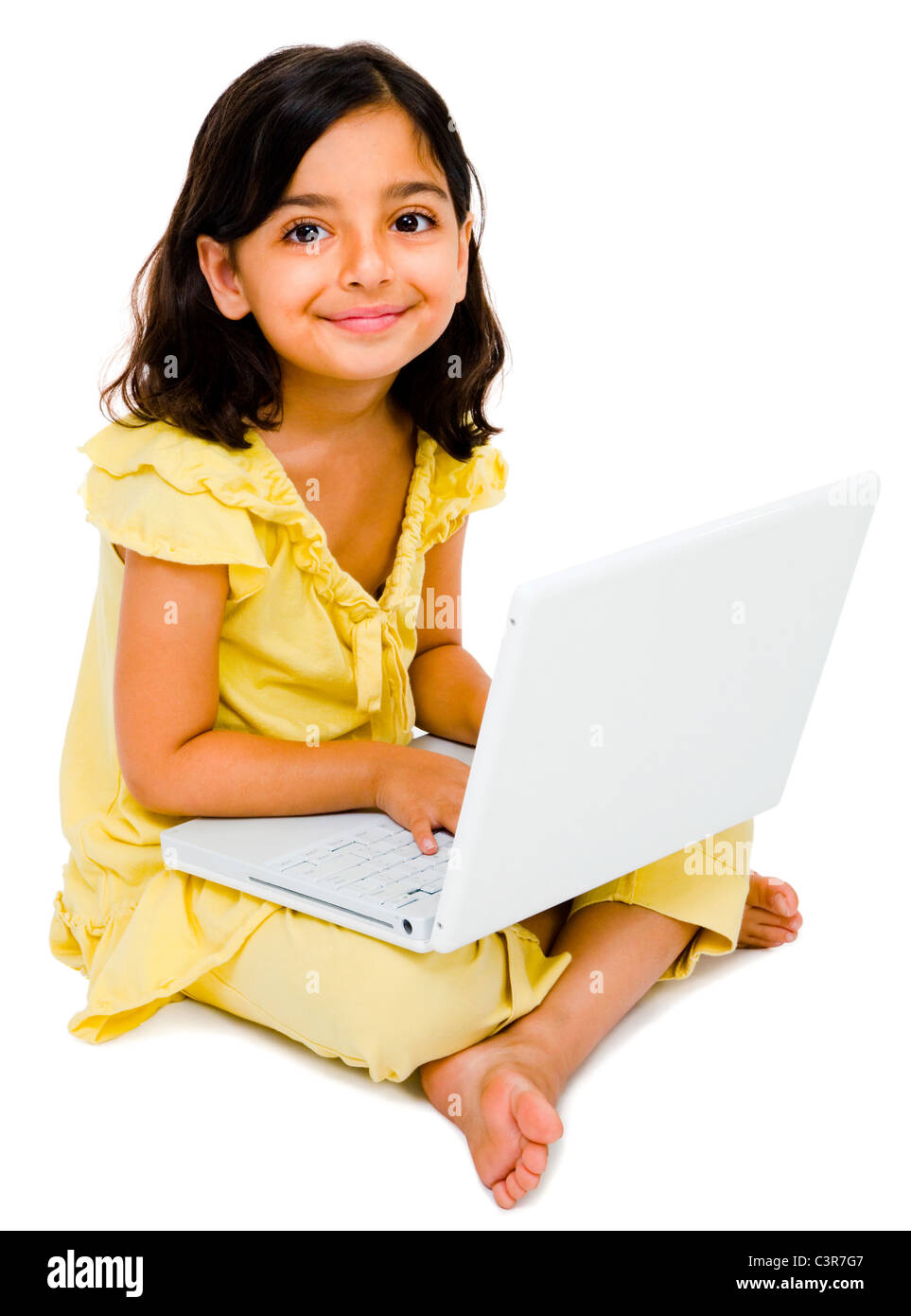 Happy girl using a laptop and posing isolated over white Stock Photo ...