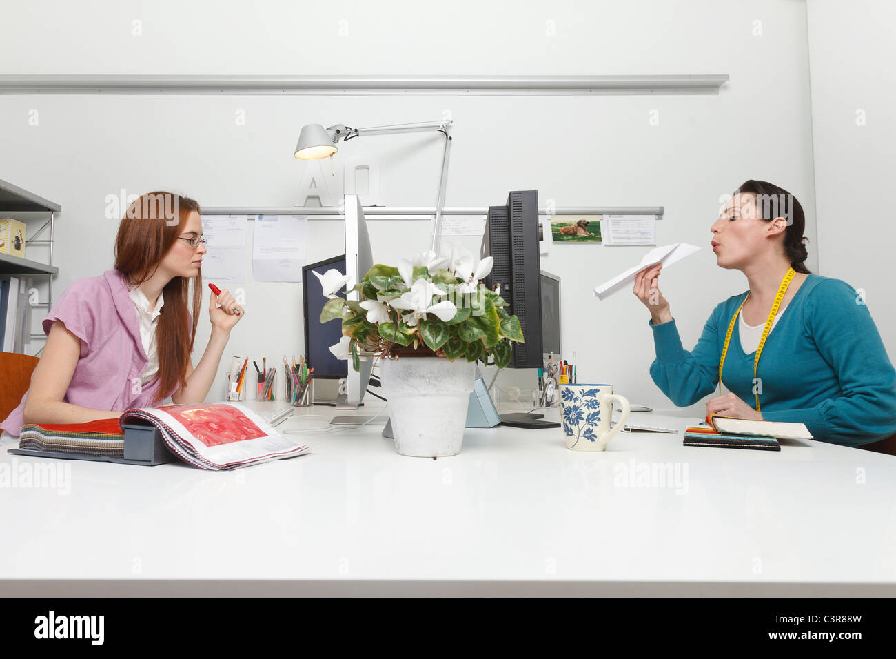 Women working in an office Stock Photo - Alamy