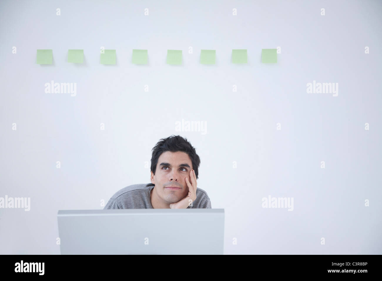 Man thinking at computer Stock Photo - Alamy