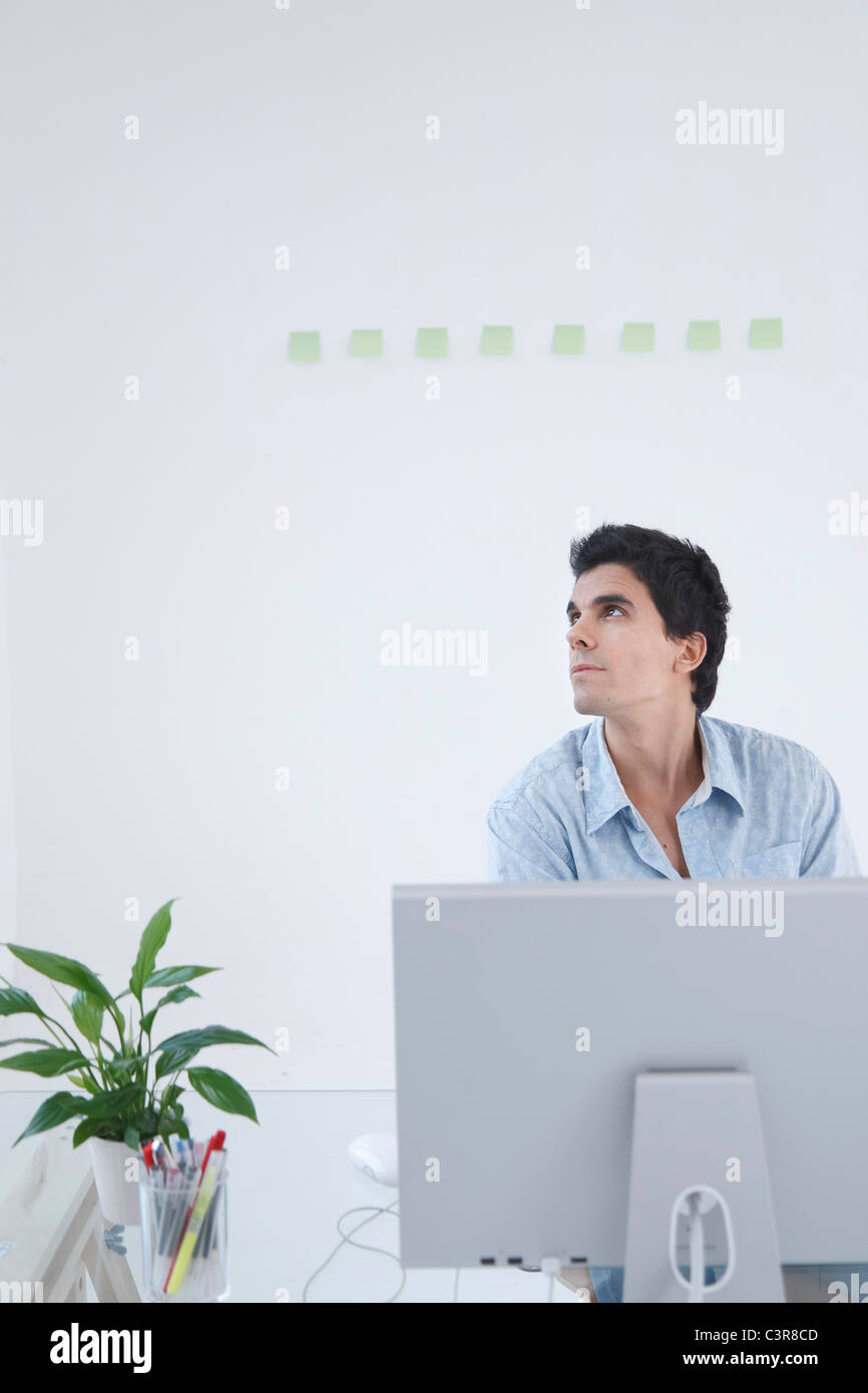 Man thinking at computer Stock Photo - Alamy