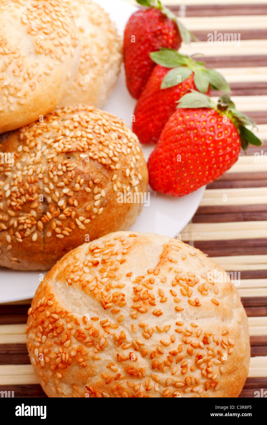 breakfast with sesame buns and strawberry, top view Stock Photo - Alamy