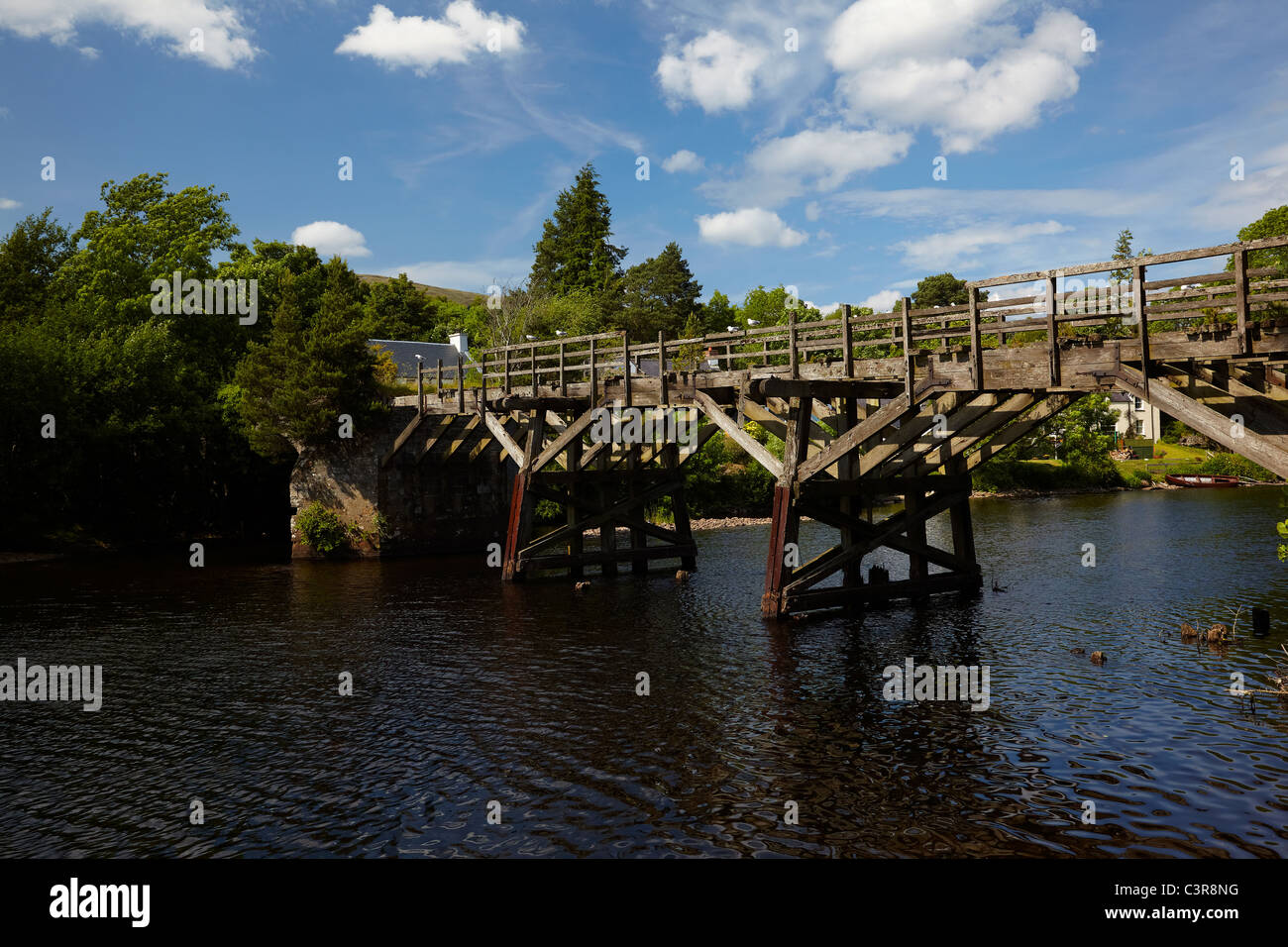 Centuries-old trestle style wooden bridge at Fort Augustus Stock Photo ...