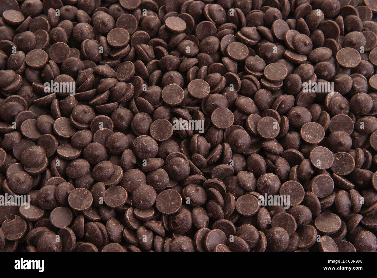 dark chocolate buttons Stock Photo - Alamy