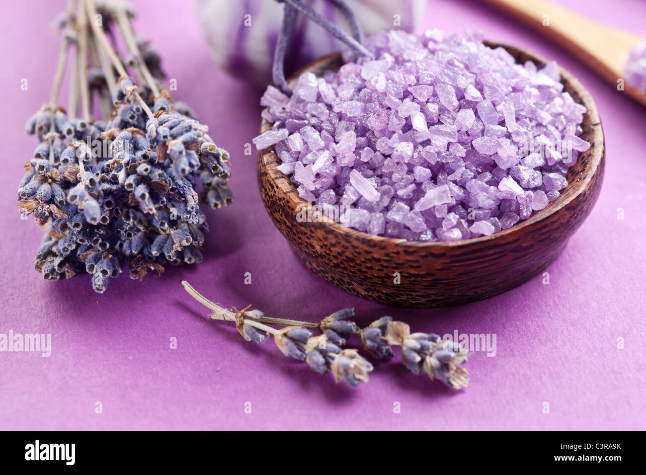 Sea-salt and dried lavender on a violet background Stock Photo - Alamy