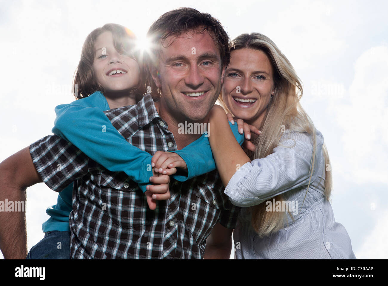 Germany, Munich, Family smiling, portrait Stock Photo - Alamy