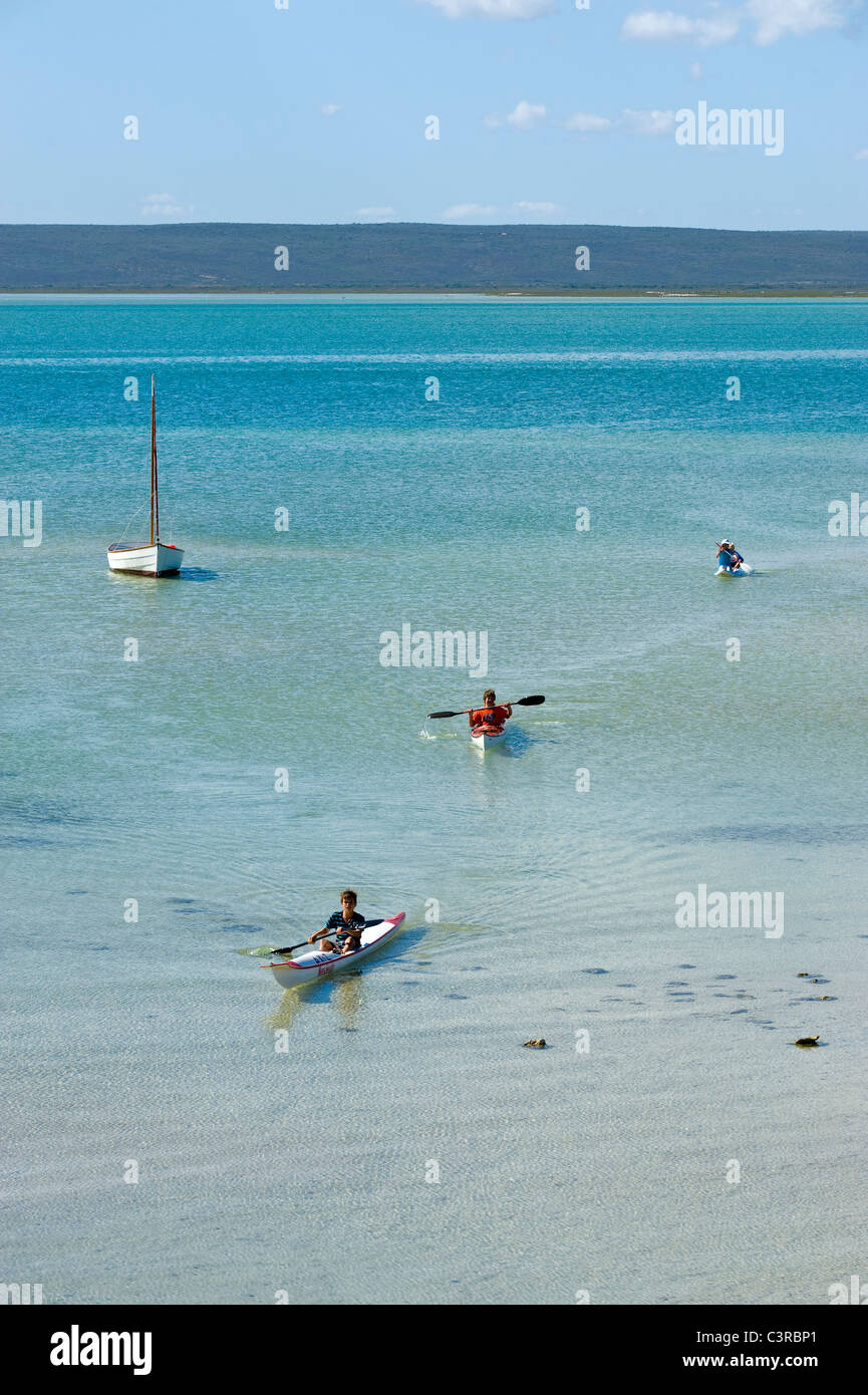Children with canoes in the Langebaan lagoon, Churchhaven in West Coast ...