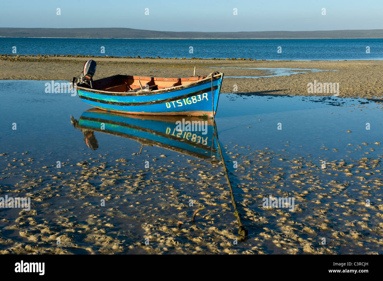 Fishing boat at low tide in Langebaan lagoon, Churchhaven in West Coast ...