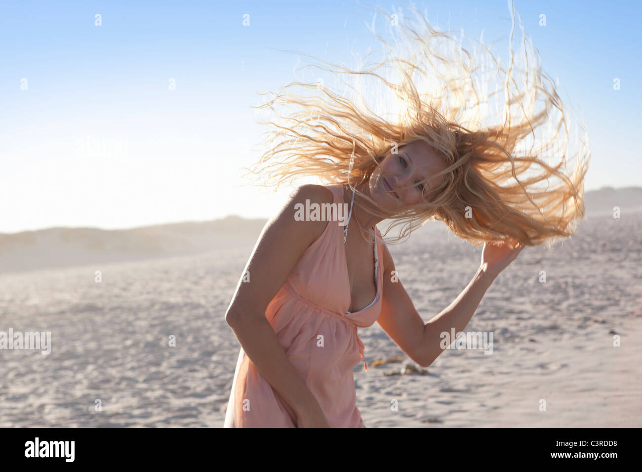 Girl shaking hair Stock Photo - Alamy