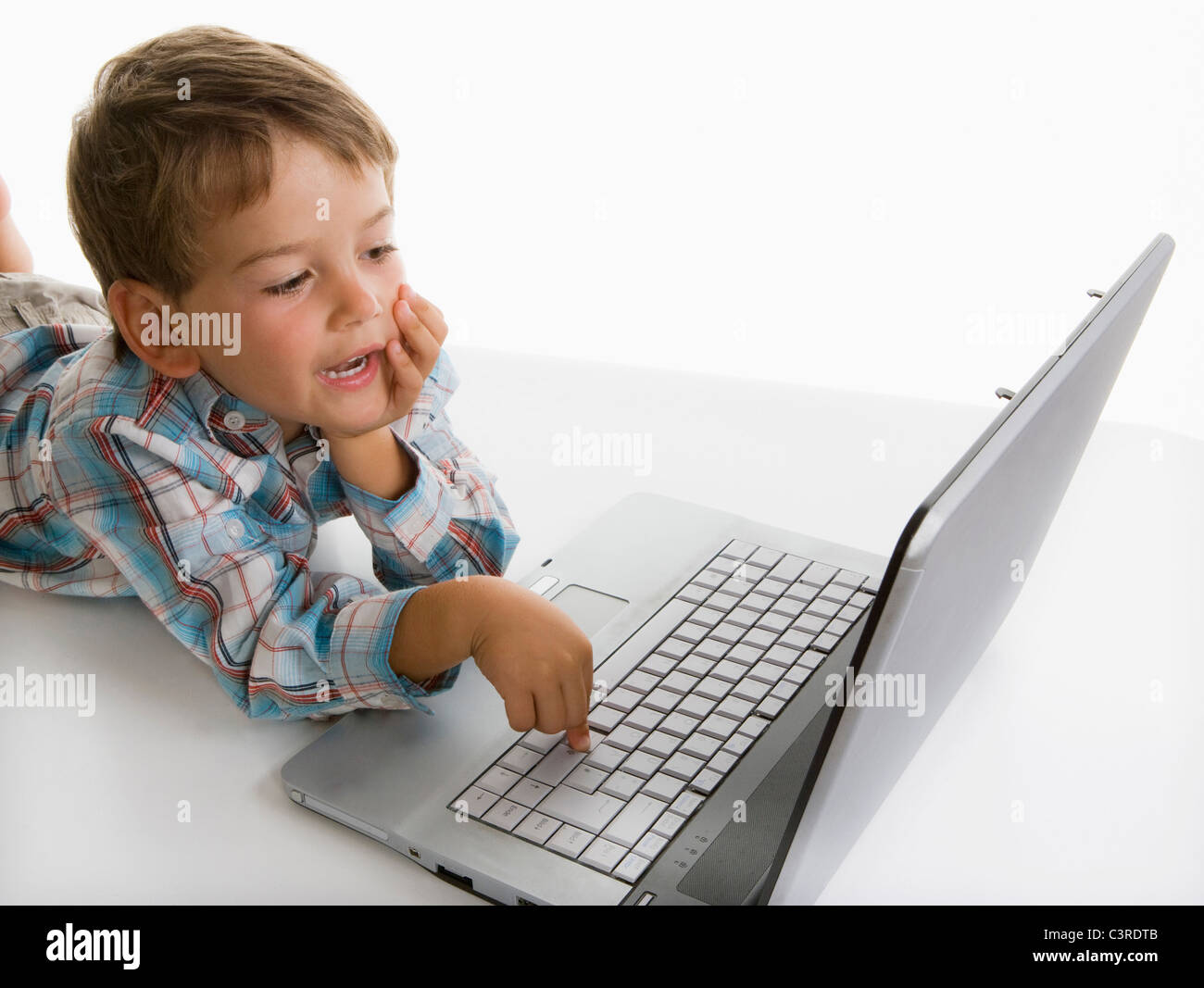 Boy (2-3) using laptop, close up Stock Photo - Alamy