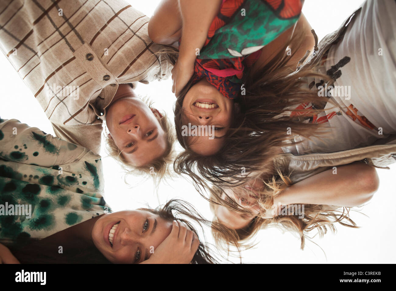Four Friends smiling Stock Photo - Alamy