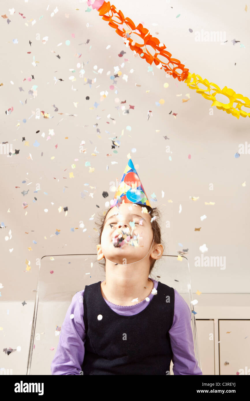 Little girl with confetti Stock Photo - Alamy