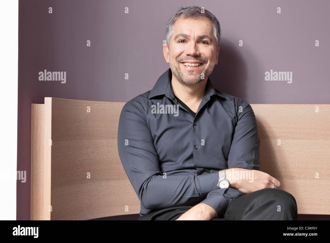 Middle aged man smiling Stock Photo - Alamy