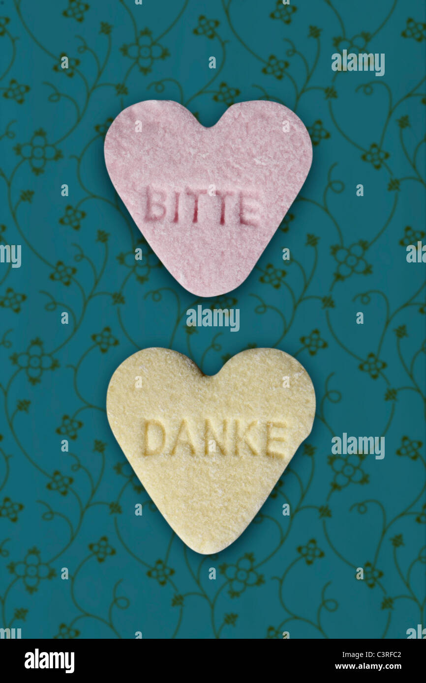 Heart shaped sweets with text Stock Photo - Alamy