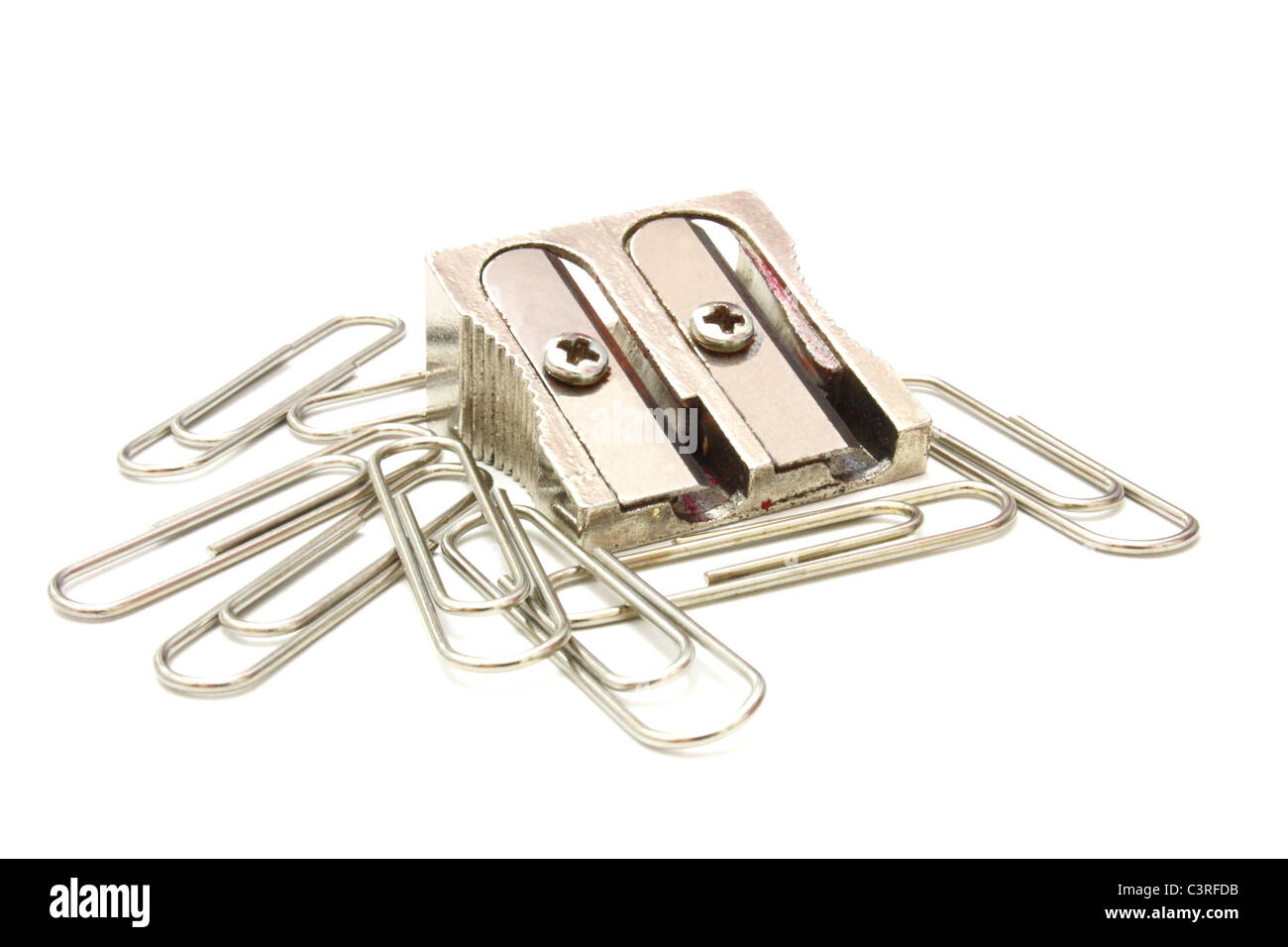 shot of eraser, pencil and pencil metal double sharpener on a white ...