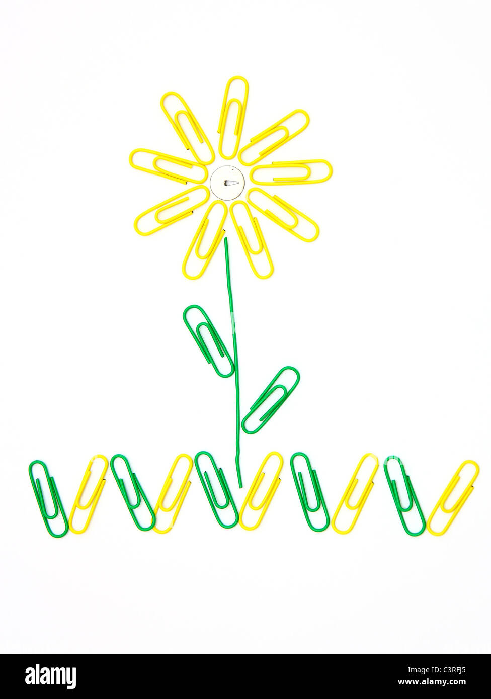 Beautiful flower on a grass from office paper clips for a paper Stock ...