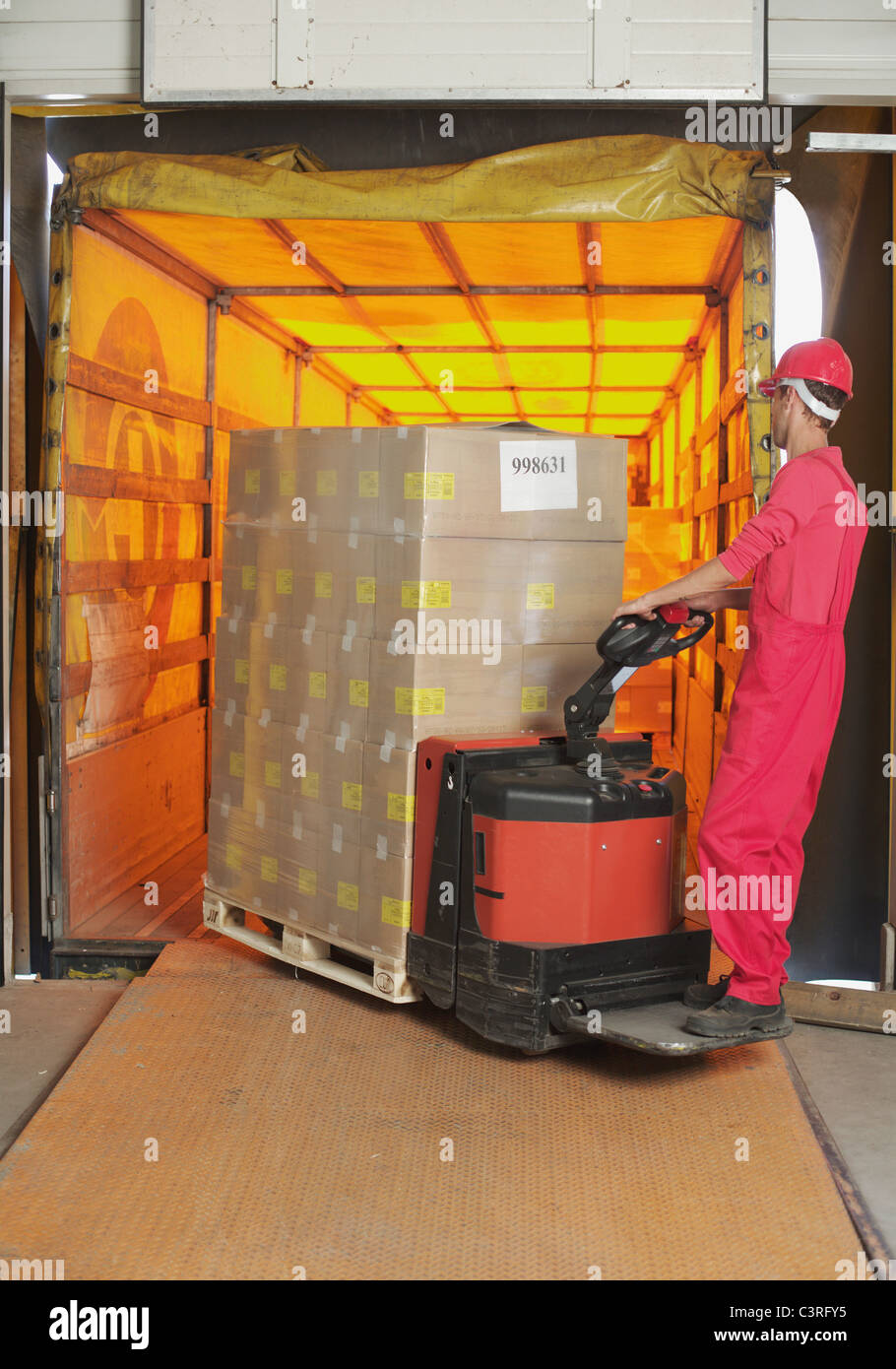 Forklift loading truck goods hi-res stock photography and images - Alamy