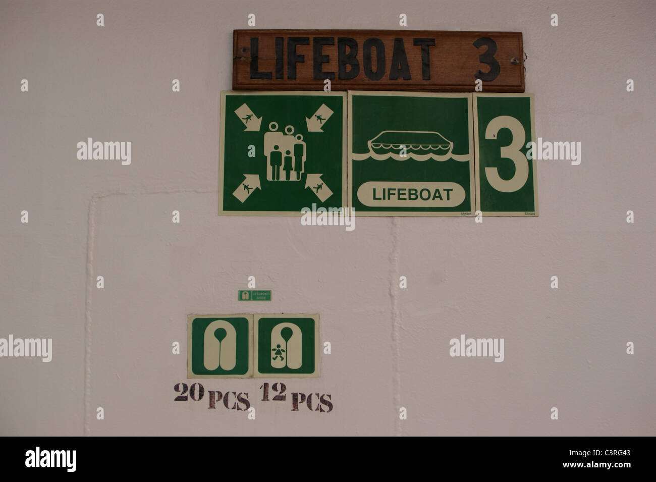 Lifeboat muster station sign aboard ocean liner 'Marco Polo'. Archive ...