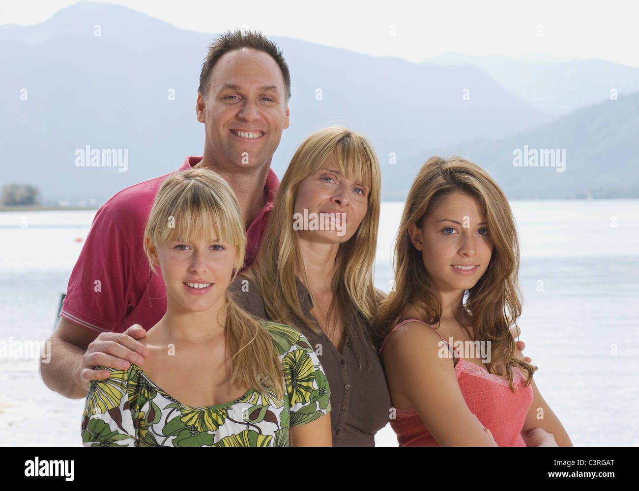 Germany, Tegernsee, Family smiling, portrait Stock Photo - Alamy