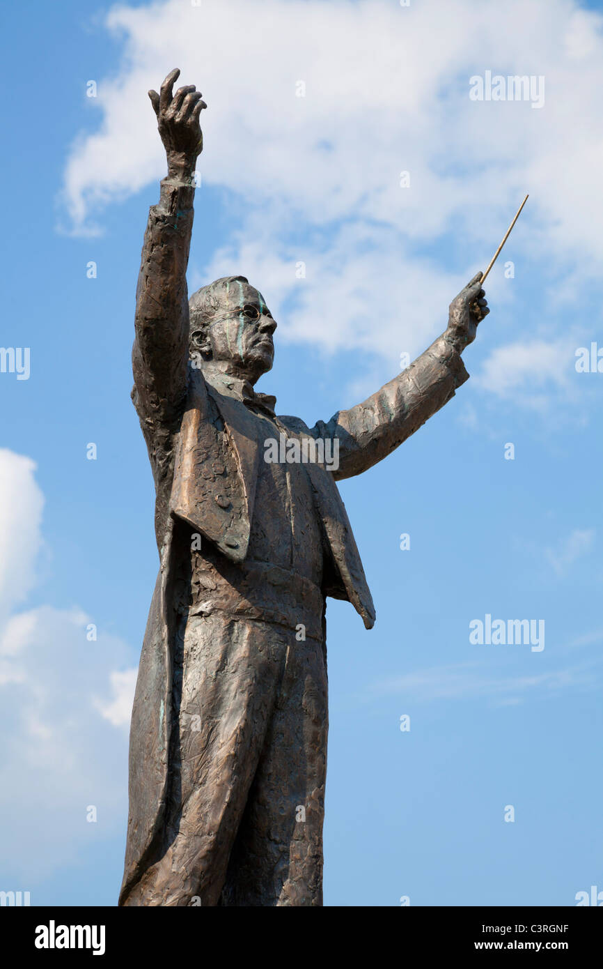 Statue of composer Gustav Holst conducting pose in Imperial Gardens ...